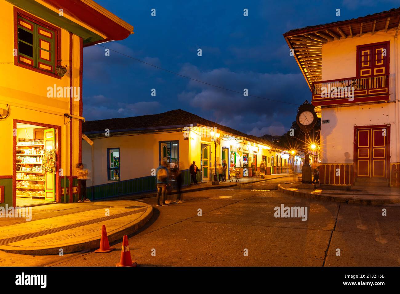 Colourful Paisa-style houses, Blue Hour, Plaza de Bolivar Salento ...