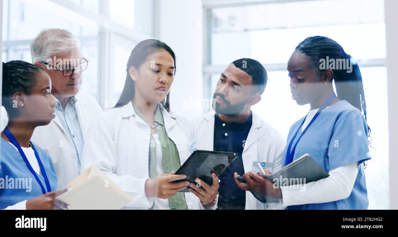 Nurses, doctors and tablet for teamwork, hospital management and healthcare planning or research ...