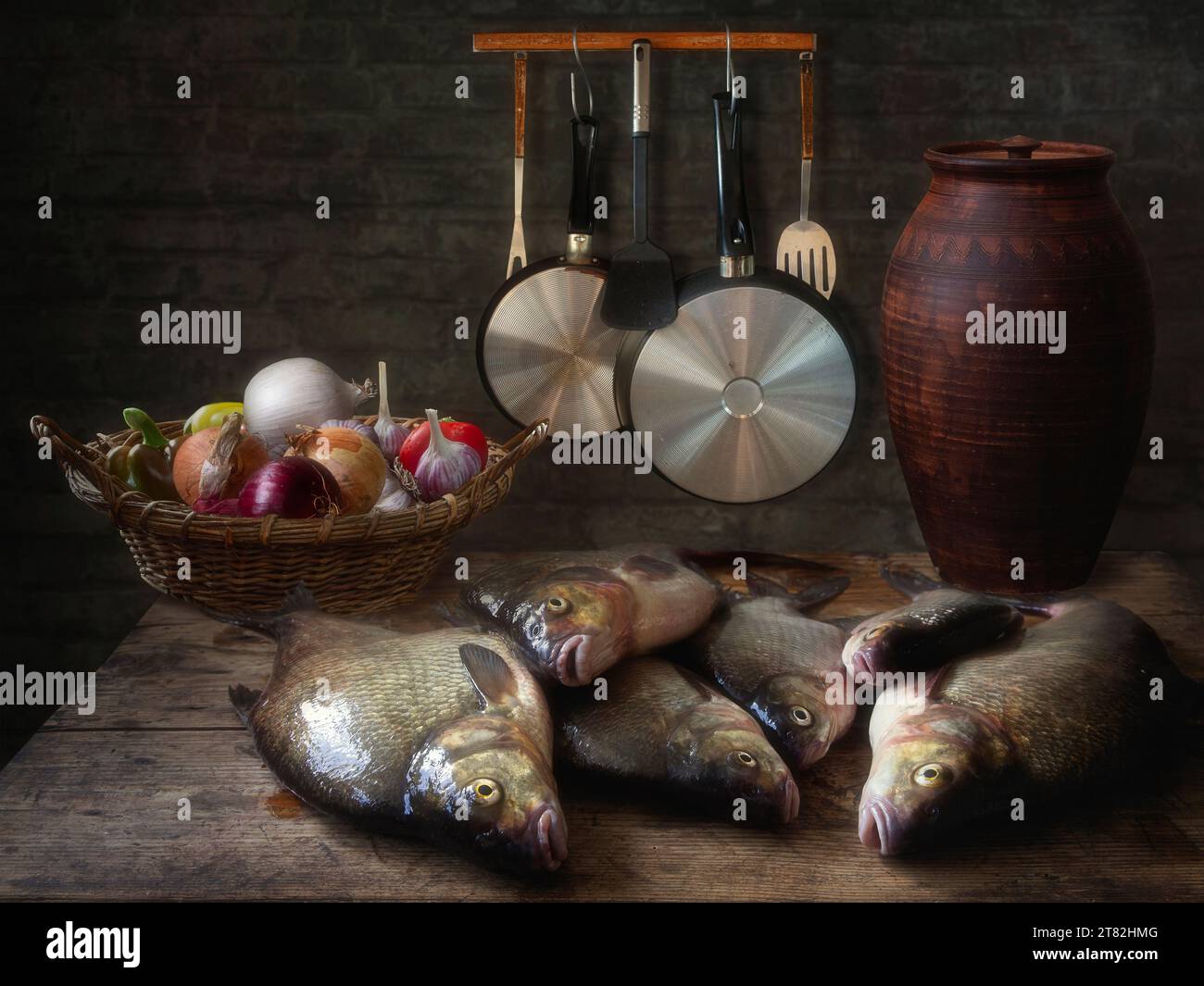Still life with fish in the kitchen Stock Photo - Alamy