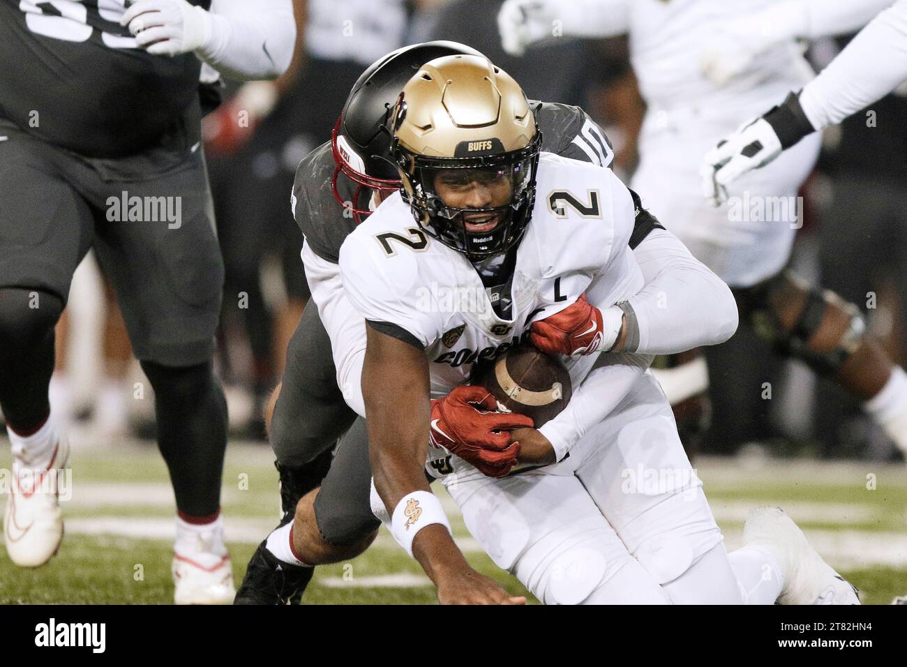 Washington State defensive end Ron Stone Jr. (10) sacks Colorado ...
