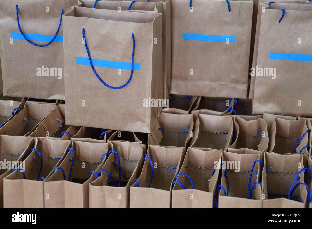 mockup group of brown paper bags with rope handles Stock Photo - Alamy
