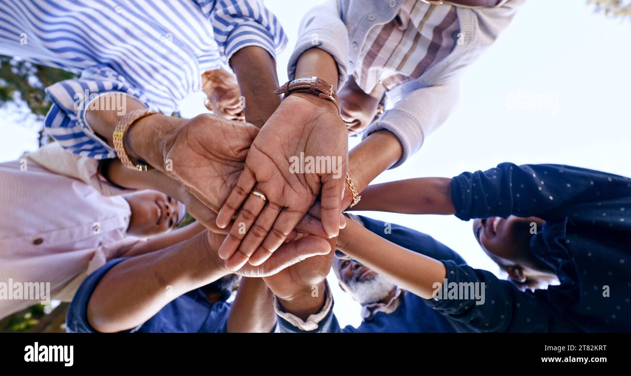 Support, huddle or hands of family in nature for fun bonding or playing ...