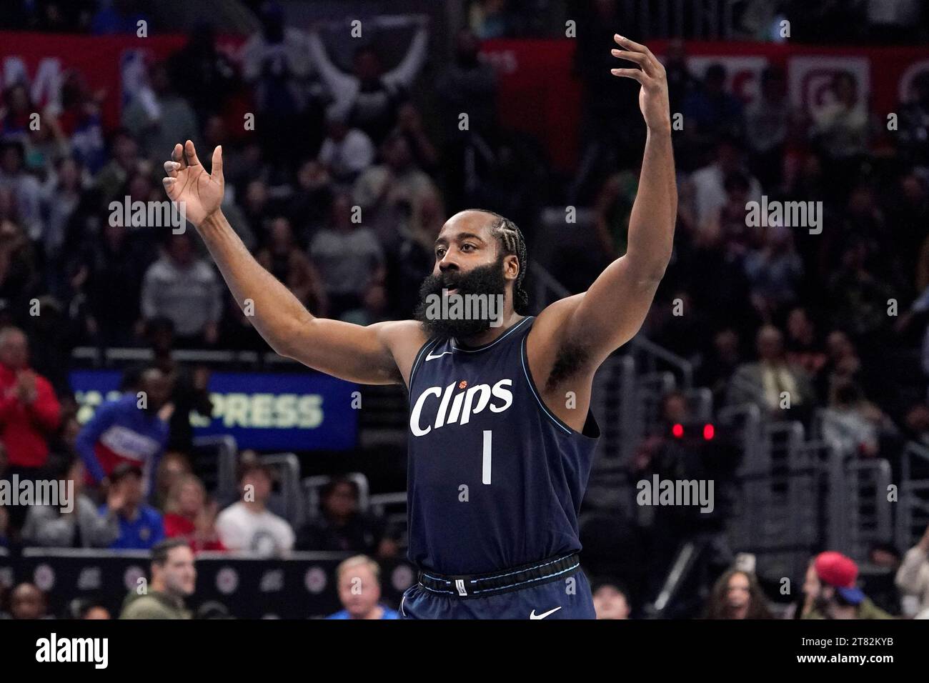 Los Angeles Clippers guard James Harden celebrates after scoring during ...