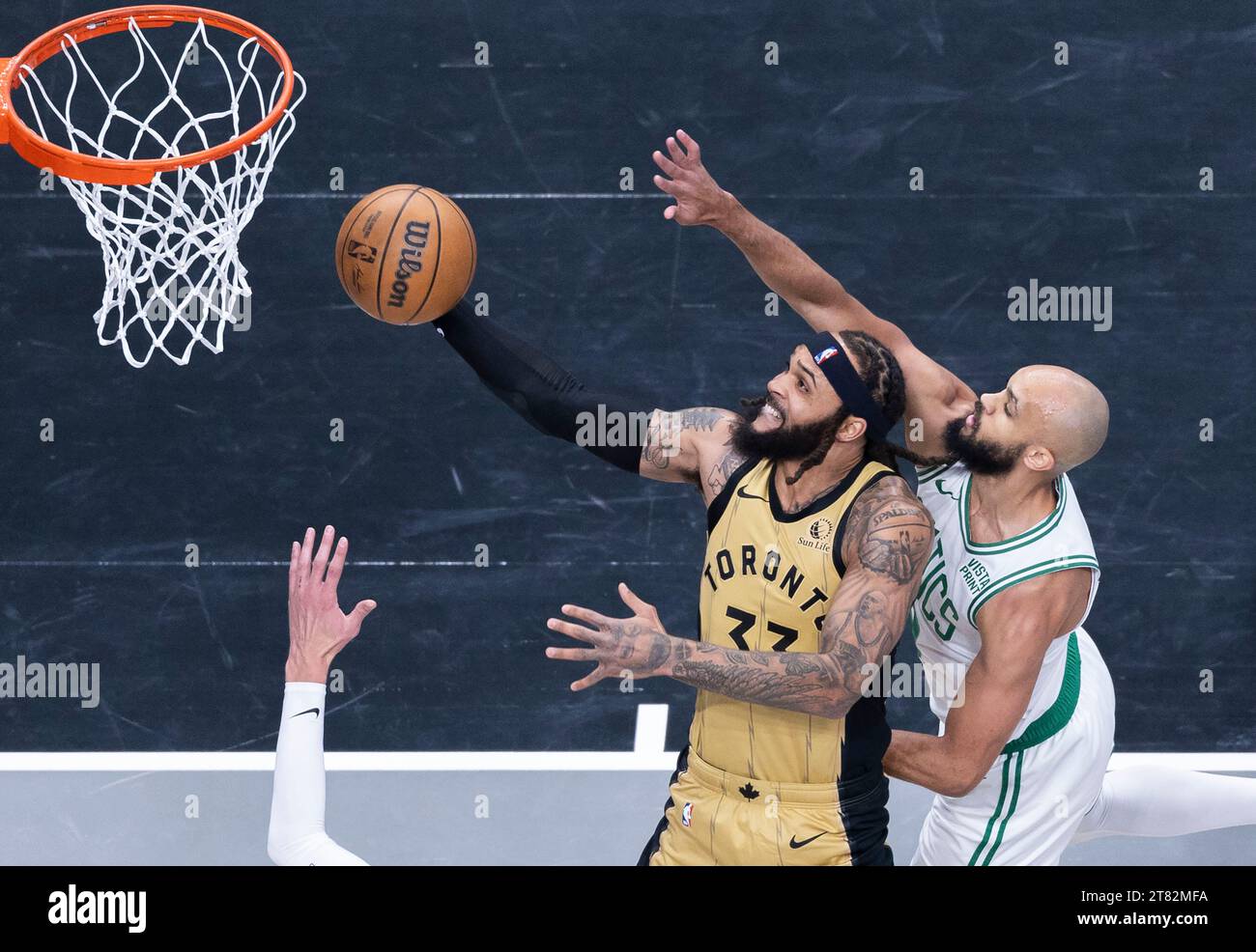 Toronto, Canada. 17th Nov, 2023. Gary Trent Jr. (2nd R) of Toronto ...