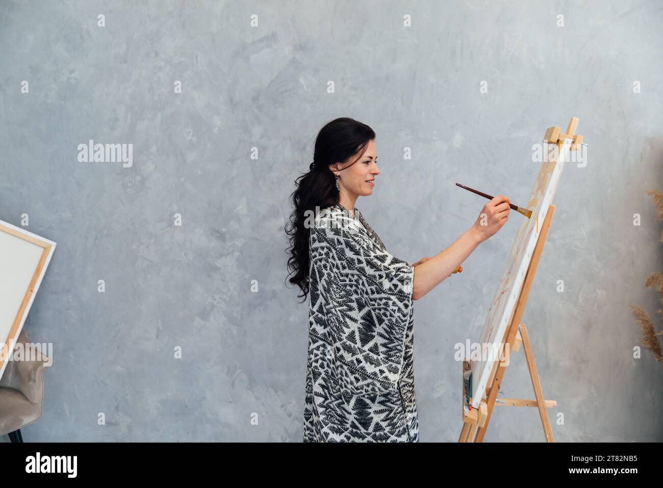 Female Artist Works on Abstract Oil Painting, Moving Paint Brush ...
