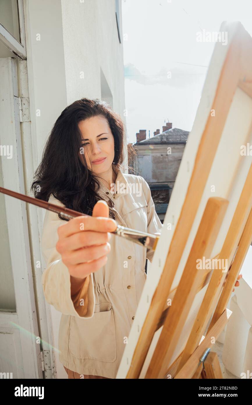 Female Artist Works on Abstract Oil Painting, Moving Paint Brush ...