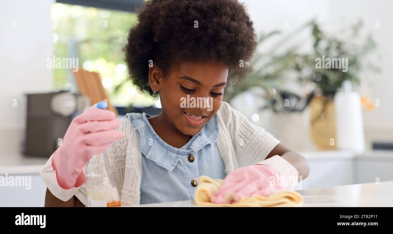 Happy black girl, cleaning table and housekeeping for hygiene ...