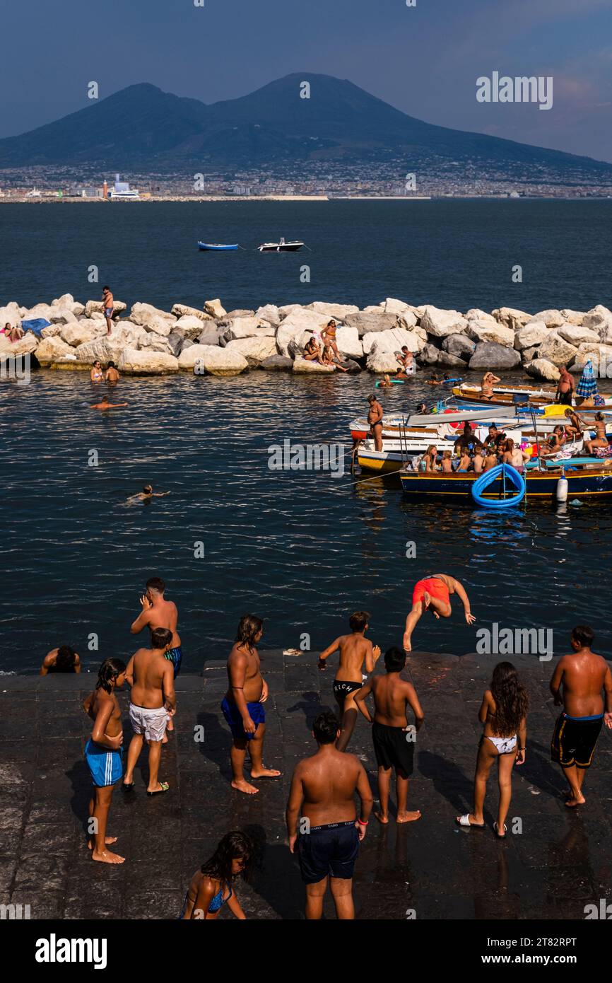 Naples, Italy - 05 August 2022 : Kids diving in the waters of Napoli ...
