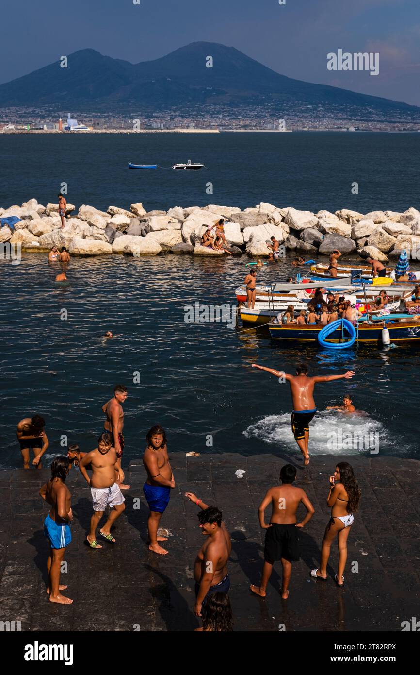 Naples, Italy - 05 August 2022 : Kids diving in the waters of Napoli ...