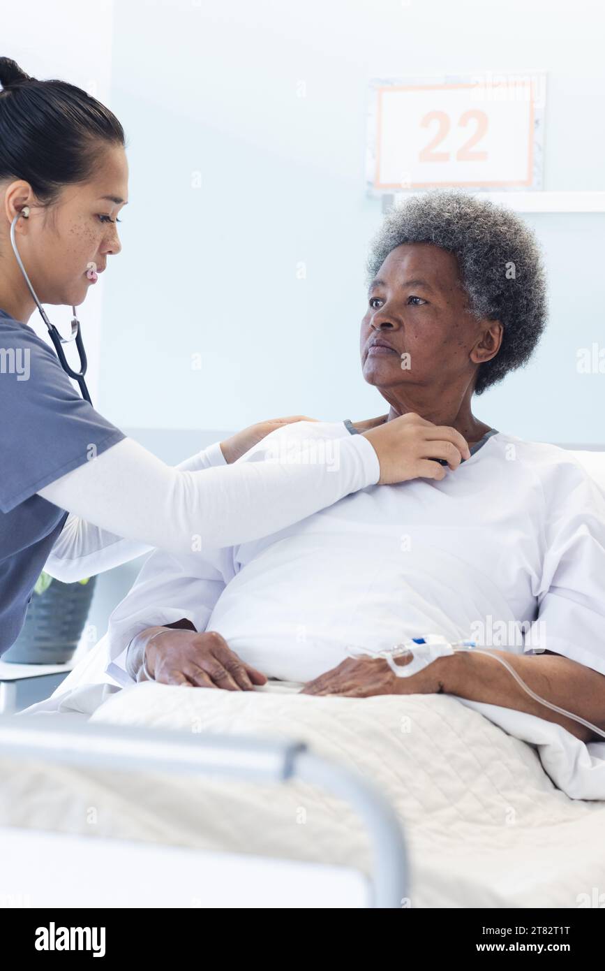 Female doctor using stethoscope in hi-res stock photography and images ...