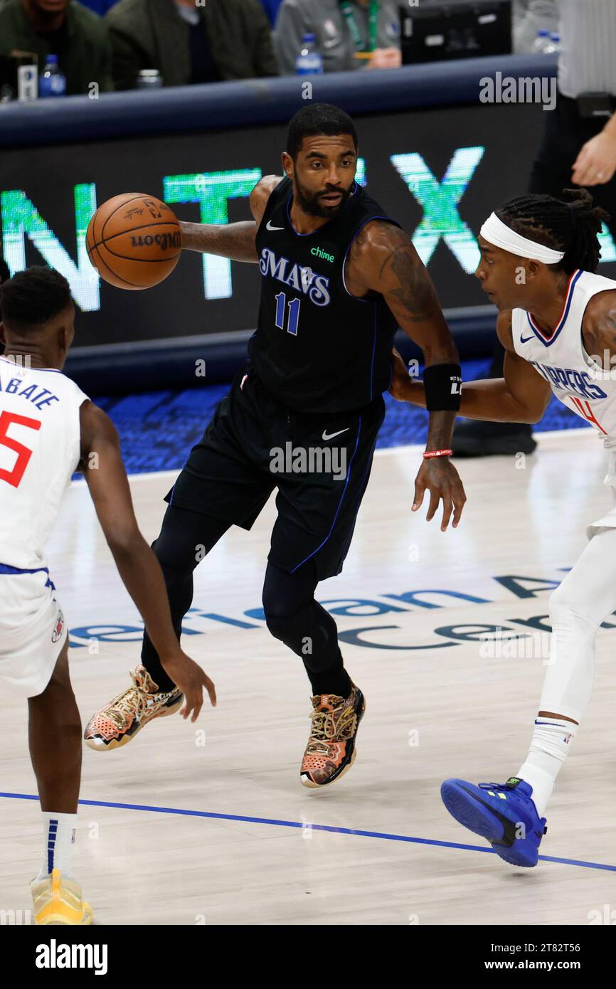 Dallas Mavericks guard Kyrie Irving (11) brings the ball up court ...