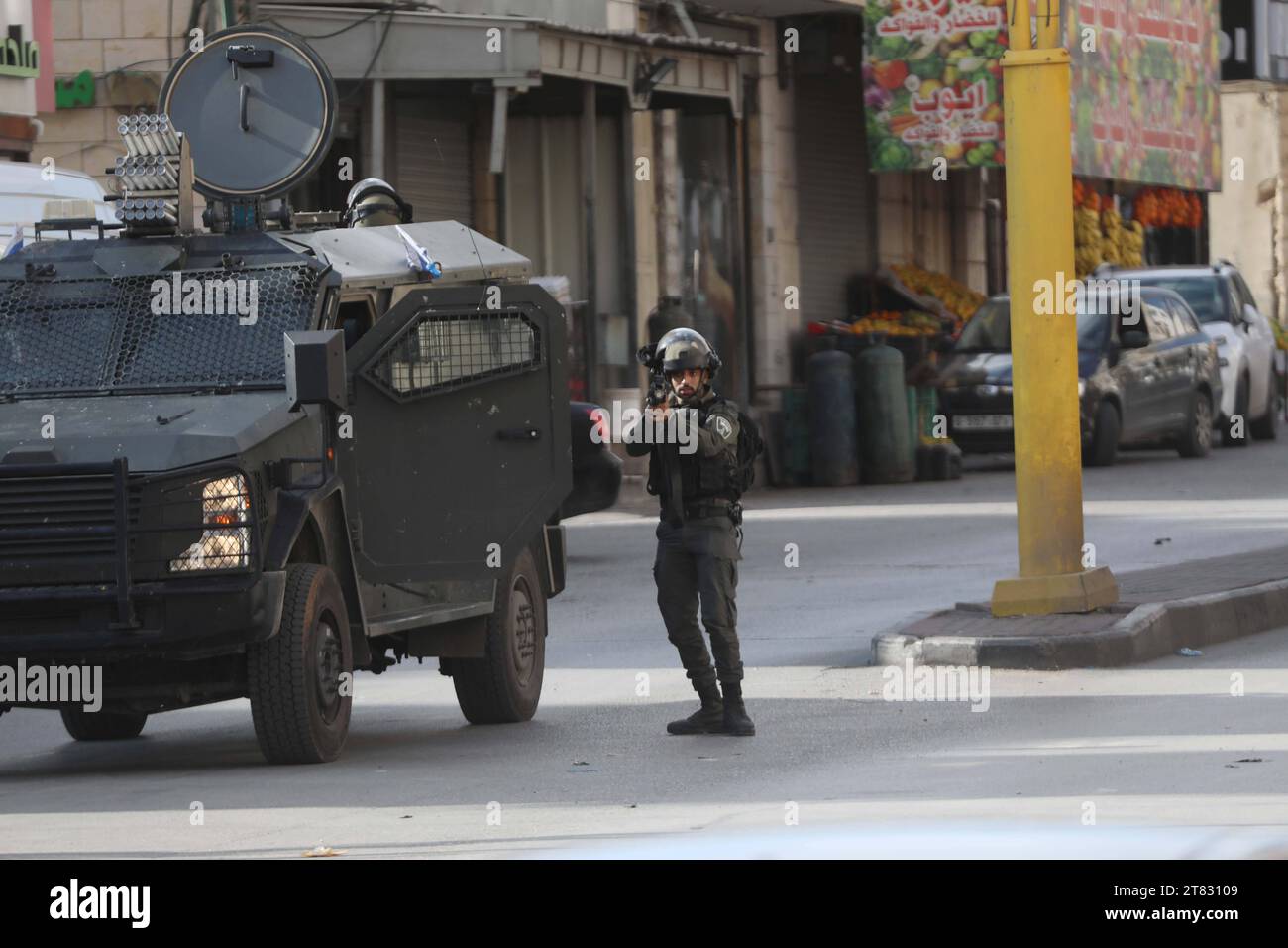 Israeli security forces surround the area of a Palestinian home ...