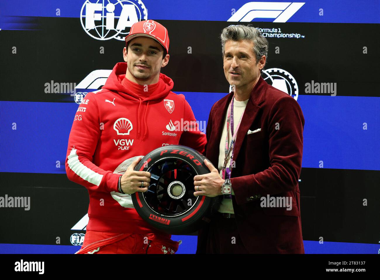 Las Vegas, USA. 17th Nov, 2023. L to R): Charles Leclerc (MON) Ferrari receives the Pirelli Pole ...