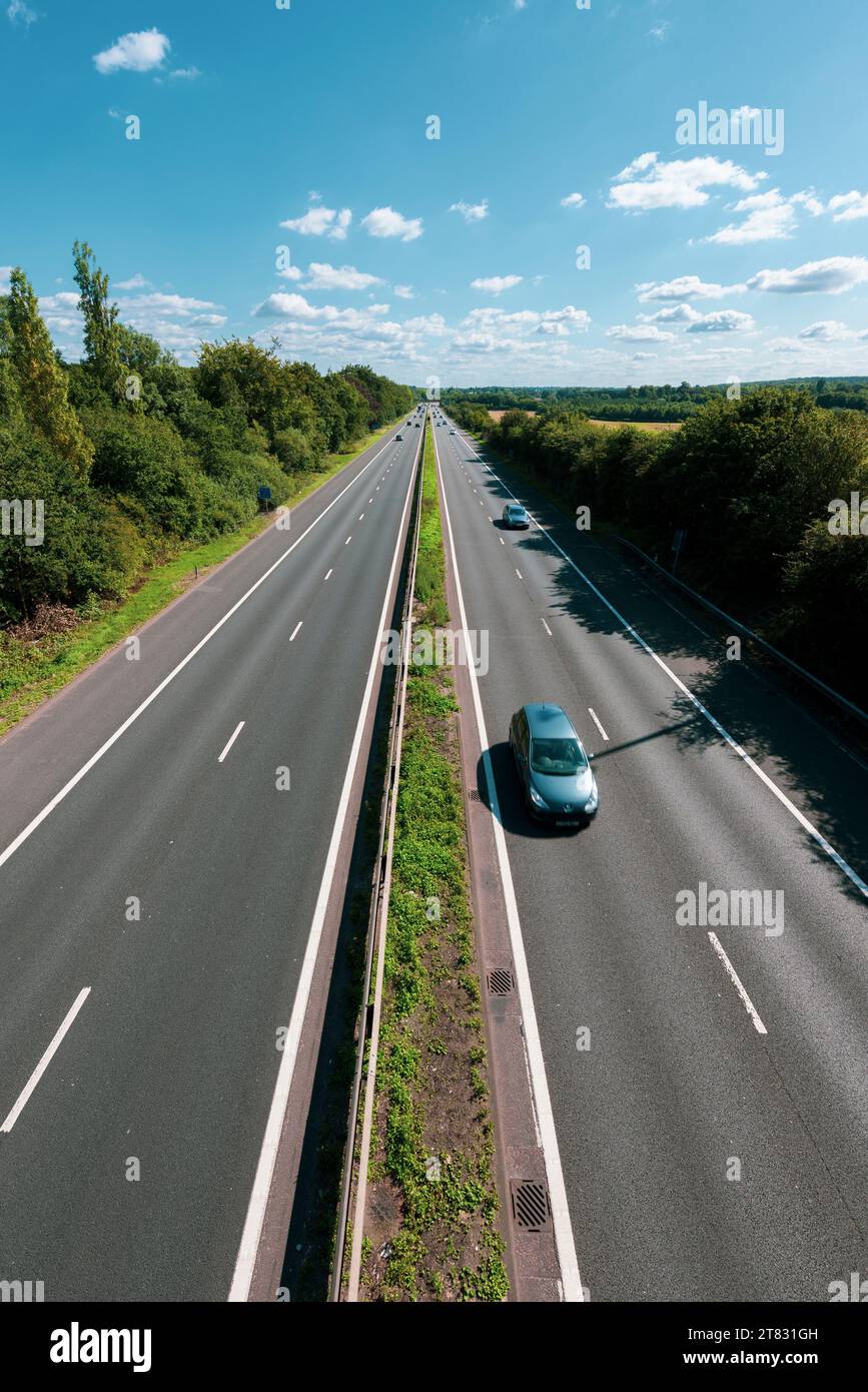 Cars travel along the A1 M motorway in Hertfordshire. England in the UK ...