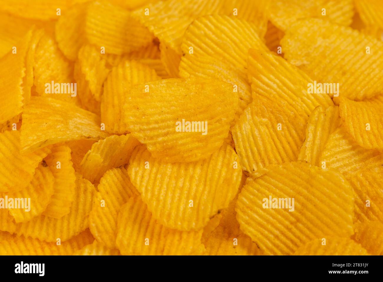 ribbed potato chips - full-frame close-up background Stock Photo - Alamy