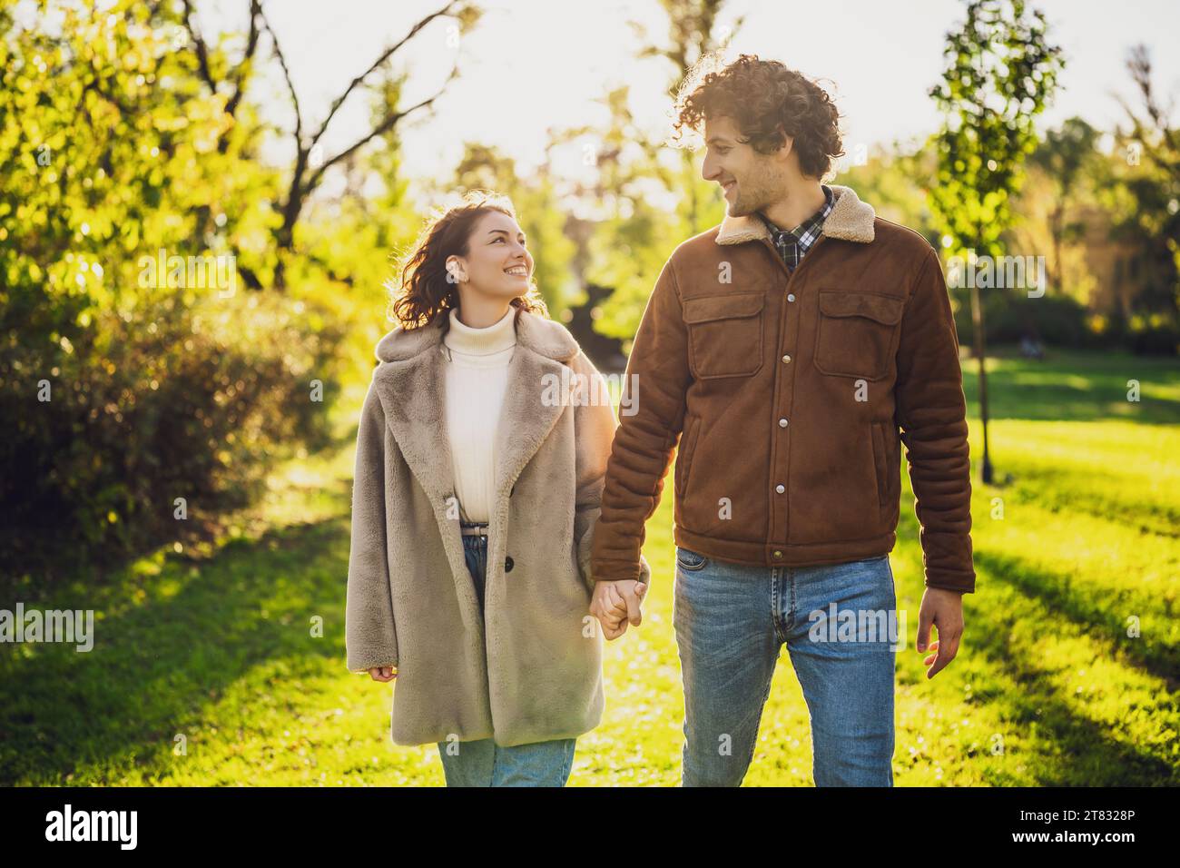Loving couple walking in park hi-res stock photography and images - Alamy