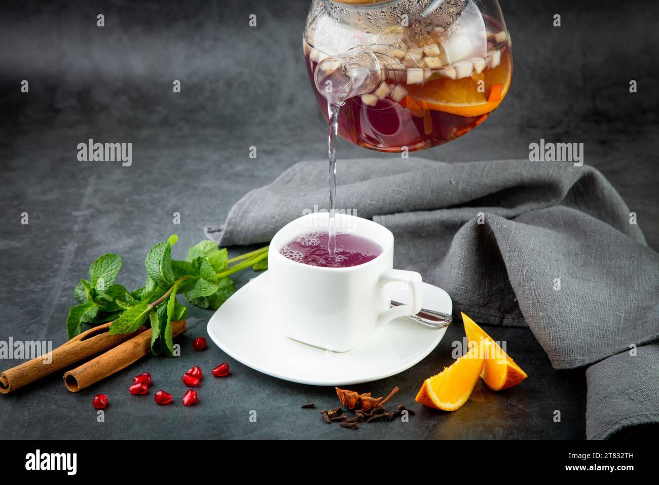 homemade fruit tea with lemon and berries side view Stock Photo - Alamy