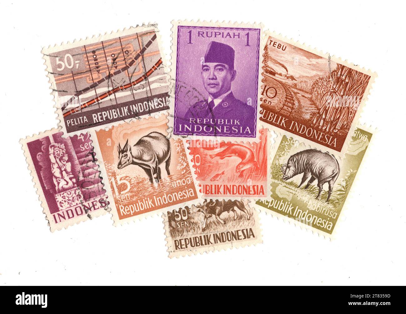 A montage of vintage postage stamps from Indonesia on a white ...