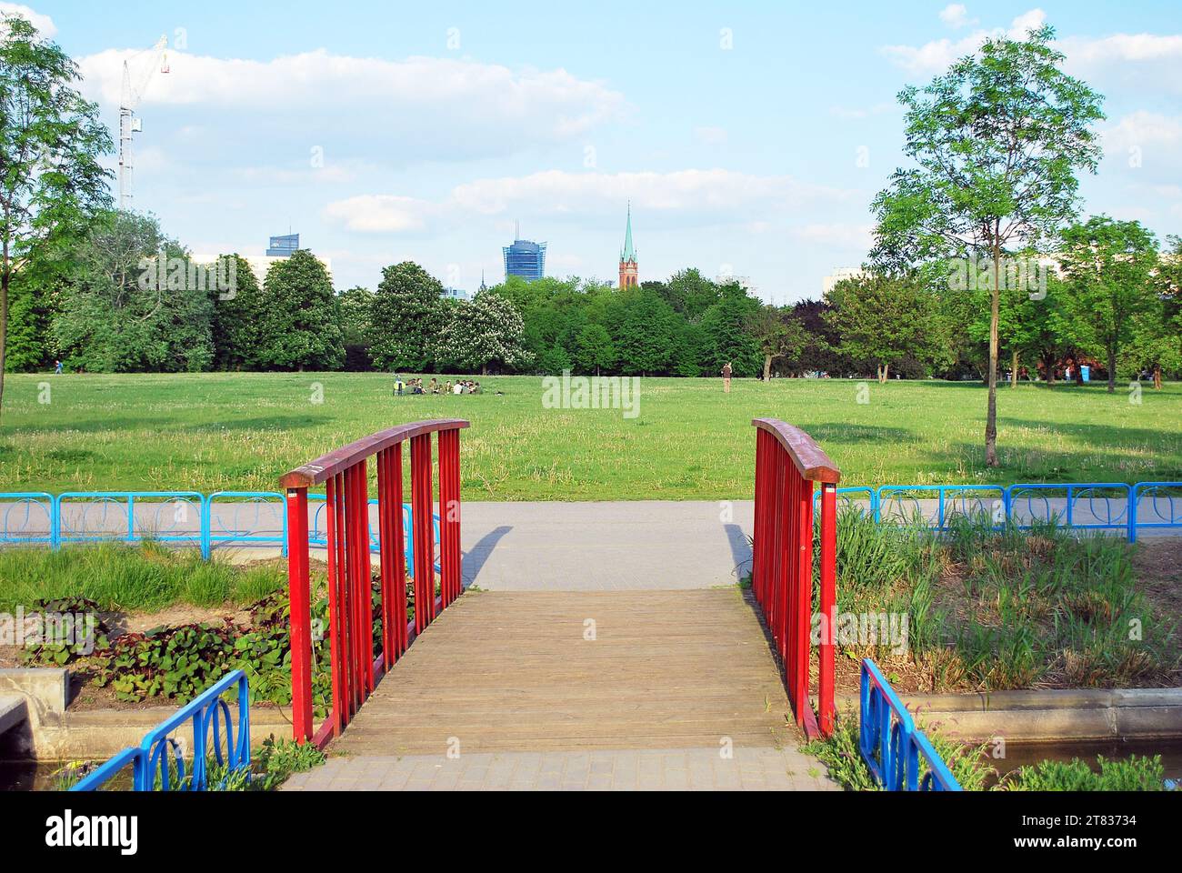 Metal concrete stone bridge with rails over the river Stock Photo - Alamy
