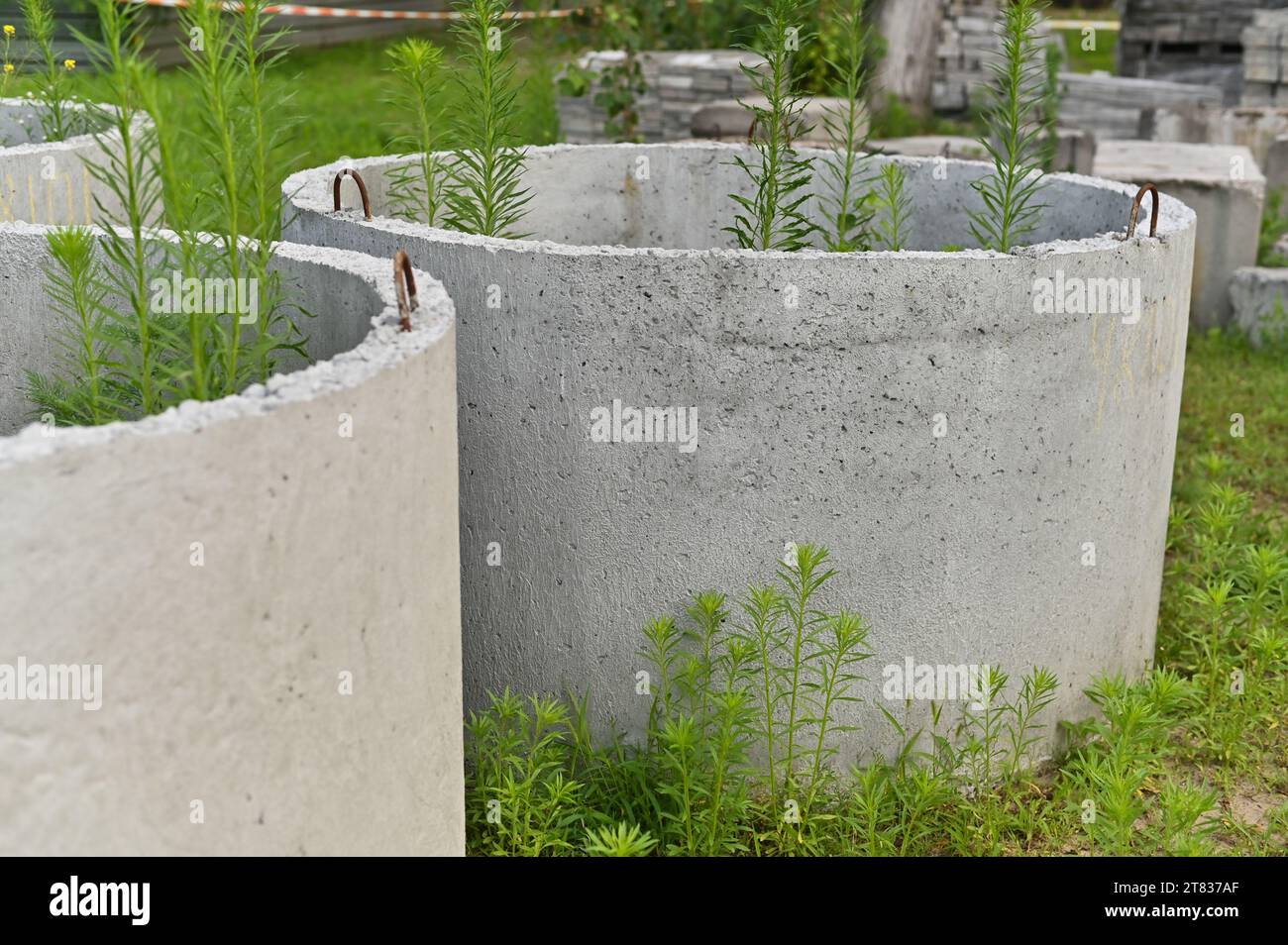 abandoned or forgotten concrete rings for the construction of drainage ...