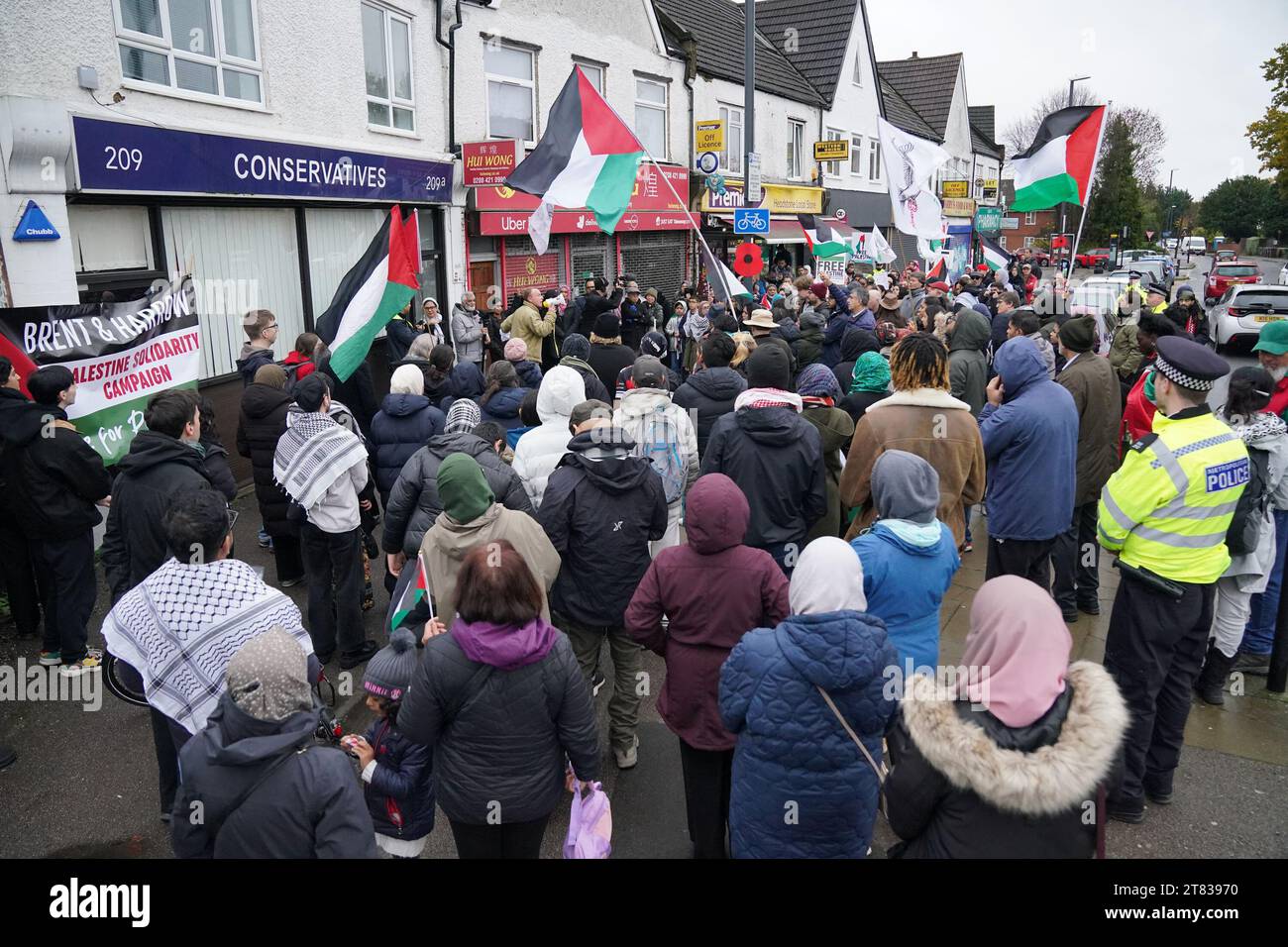 People take part in a Palestine Day of Action demonstration, outside ...