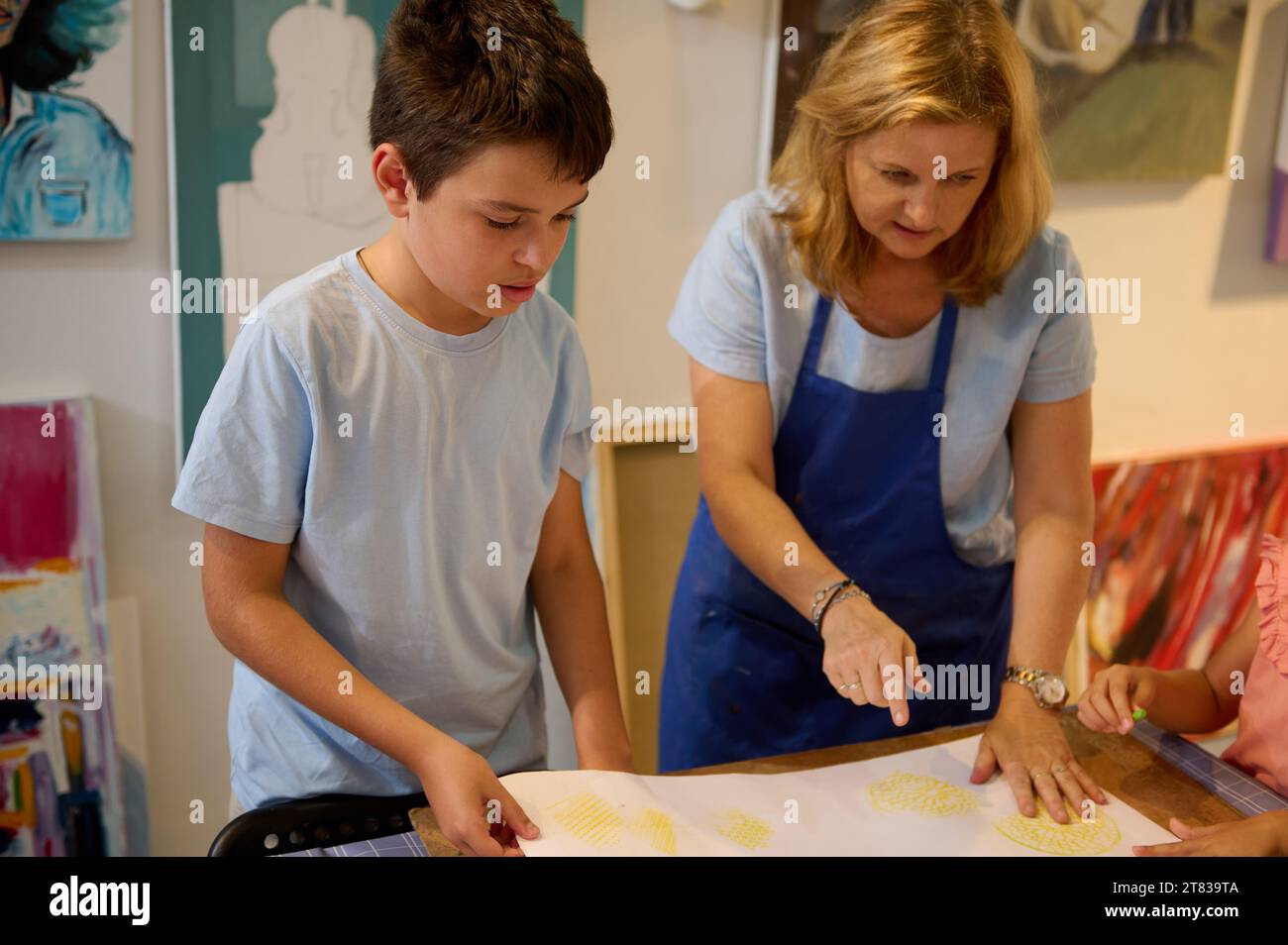 Authentic professional portrait of a female painter artist teaching ...