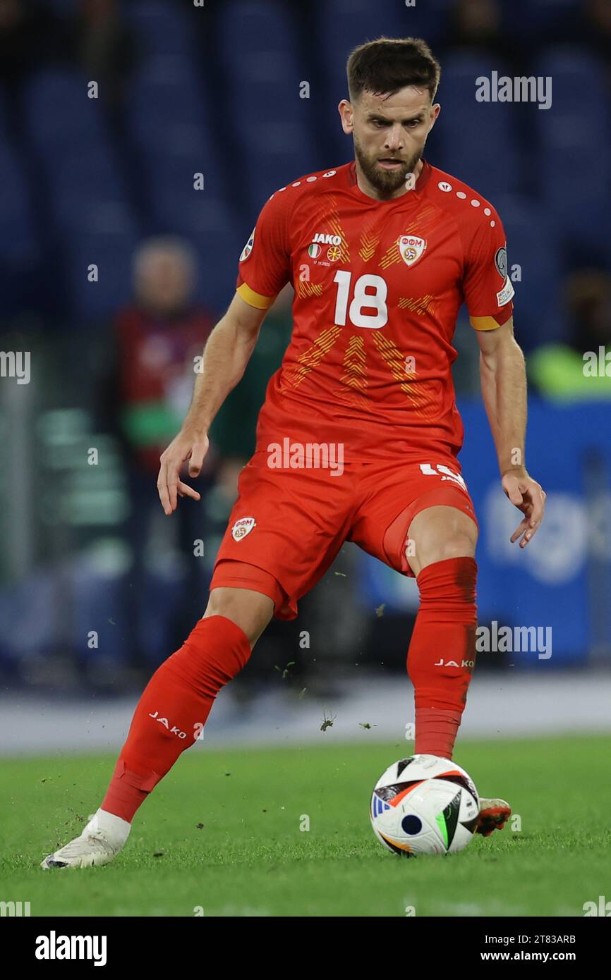 Isnik Alimi of North Macedonia controls the ball during the Euro 2024 ...