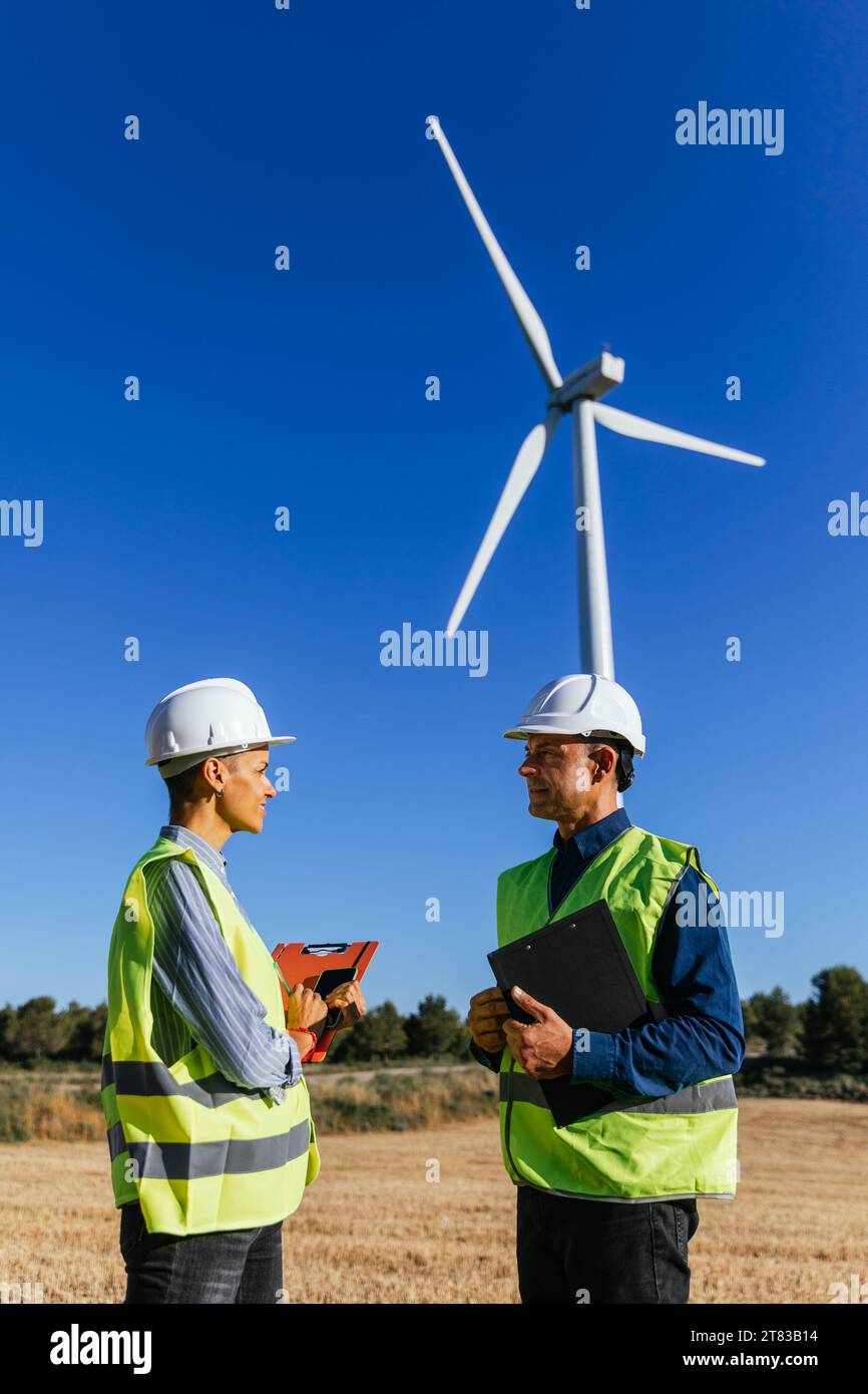 Two engineers working in renewable energy Stock Photo - Alamy