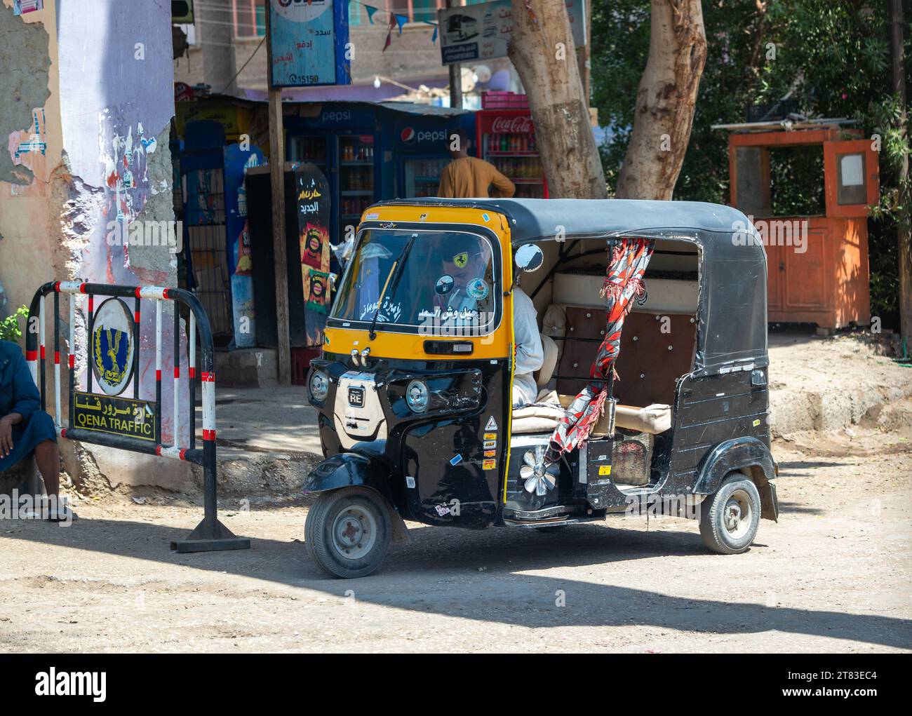 A Tuk Tuk three wheeled taxi waiting for the next customer in Qena ...