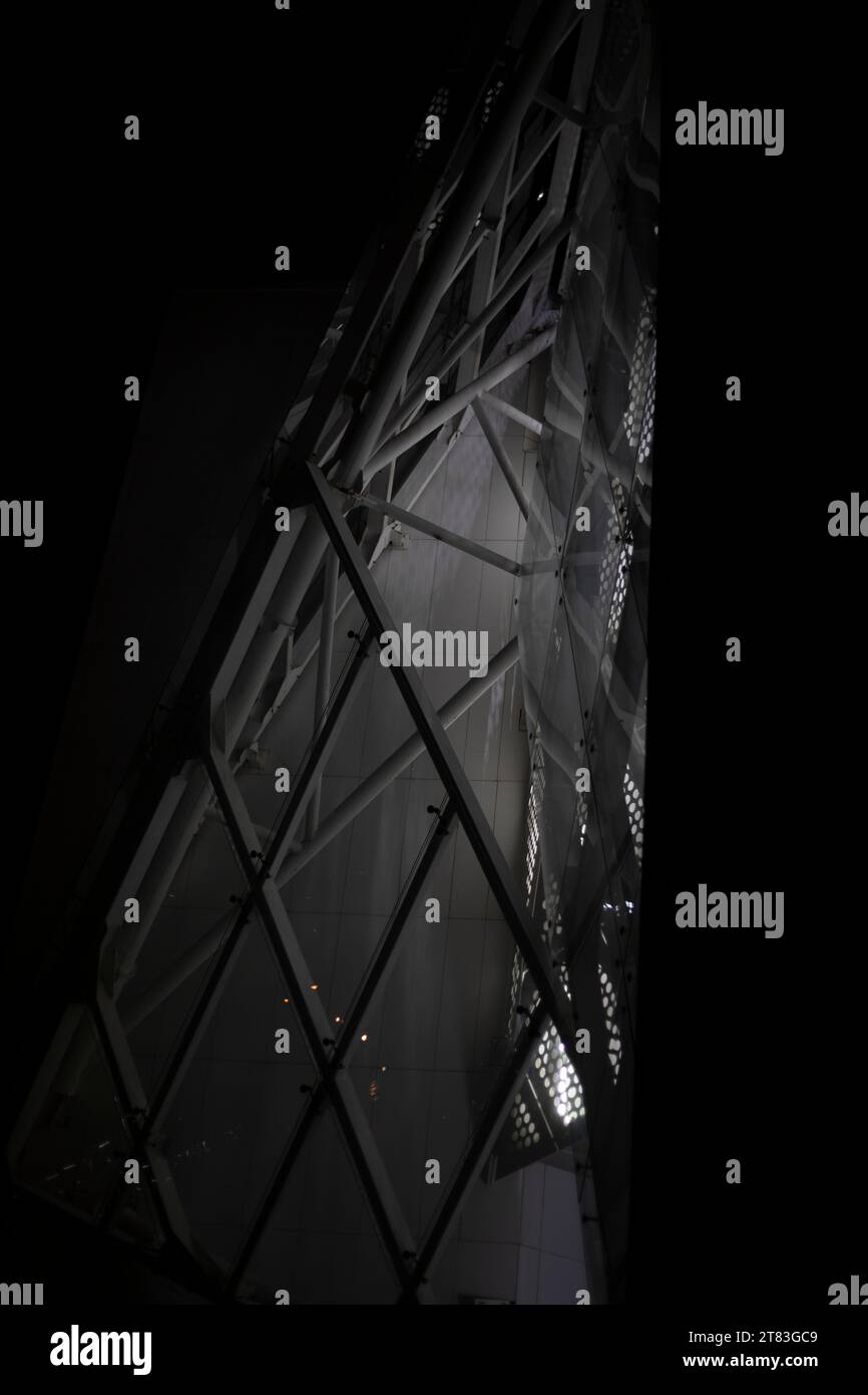 The building is at night. Modern architecture in detail. Steel ...