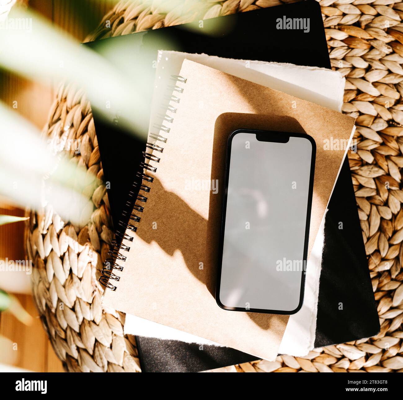 Blank path screen mobile phone with mockup on various notepads in ...