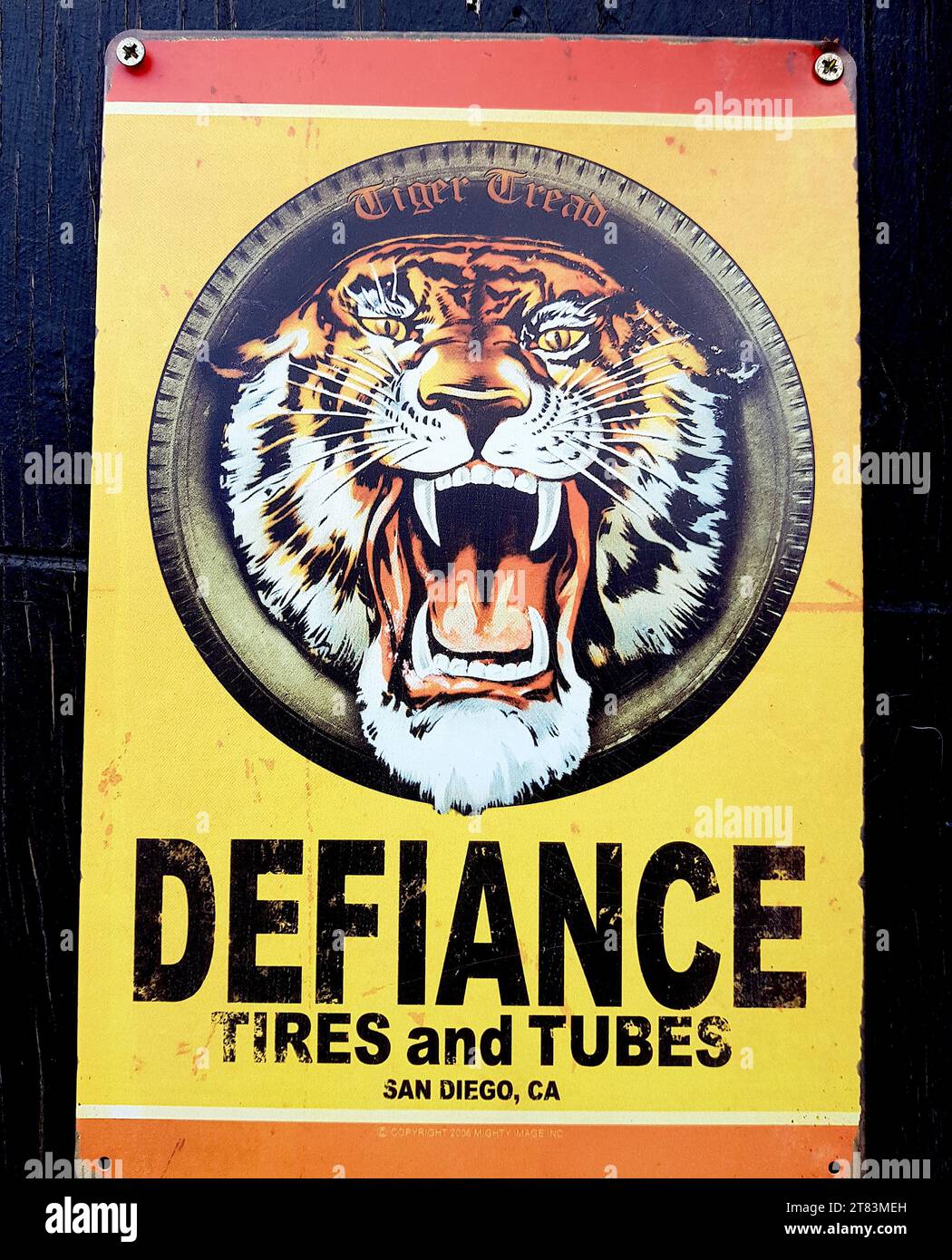 Close up of vintage enamel tiger sign advertising tyres and tubes Stock ...