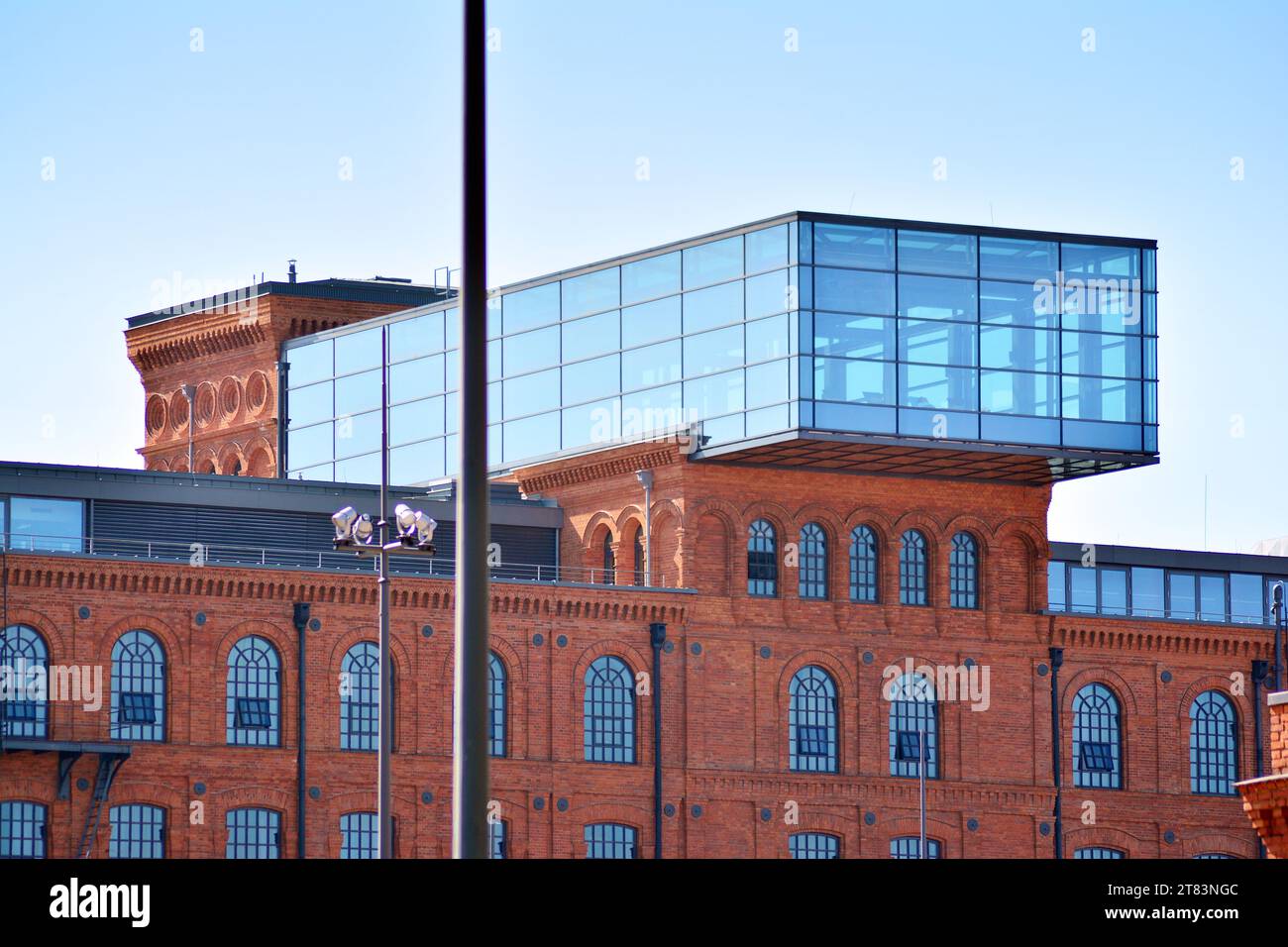 Abstract closeup of the glass-clad facade of a modern building covered ...