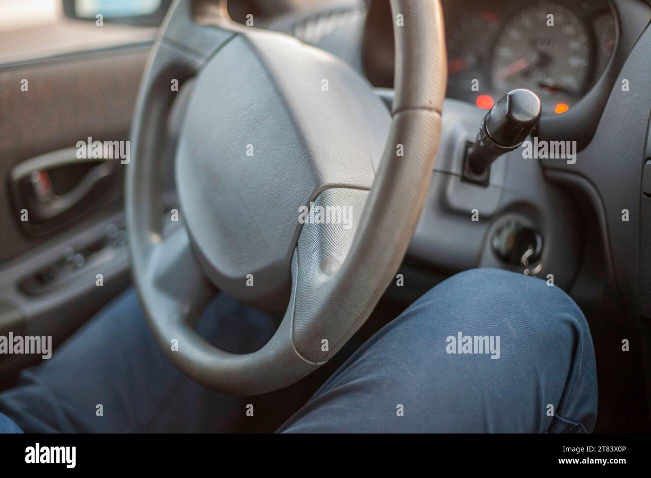 The wheel of a car. Machine control. Inside the machine. Man behind the ...