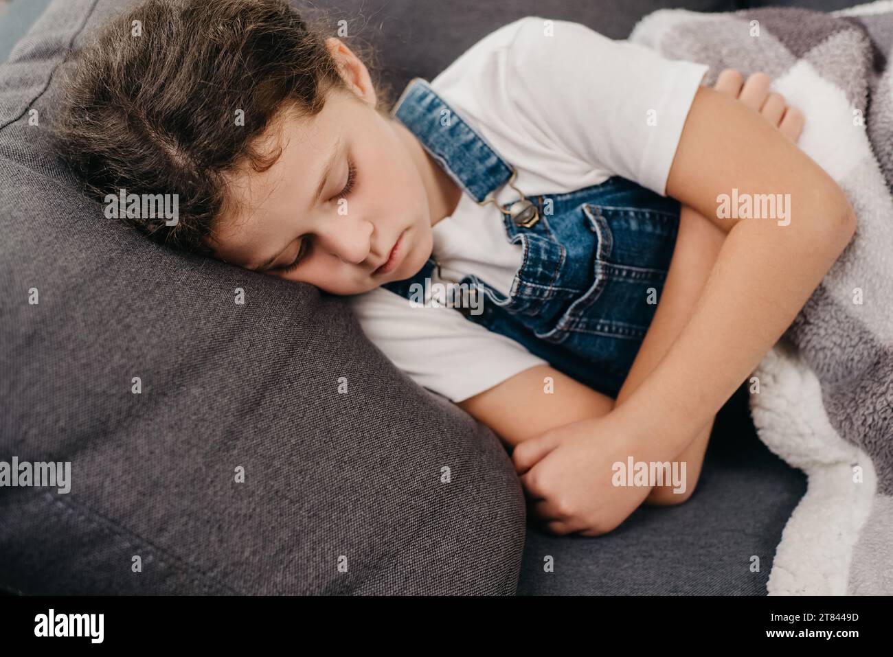 Upset small caucasian kid has fever. Concept of health, illness ...