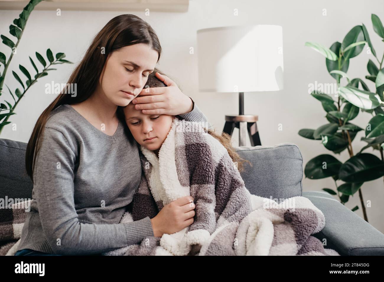 Caring mum comforting sad ill kid, expressing love and support, child ...