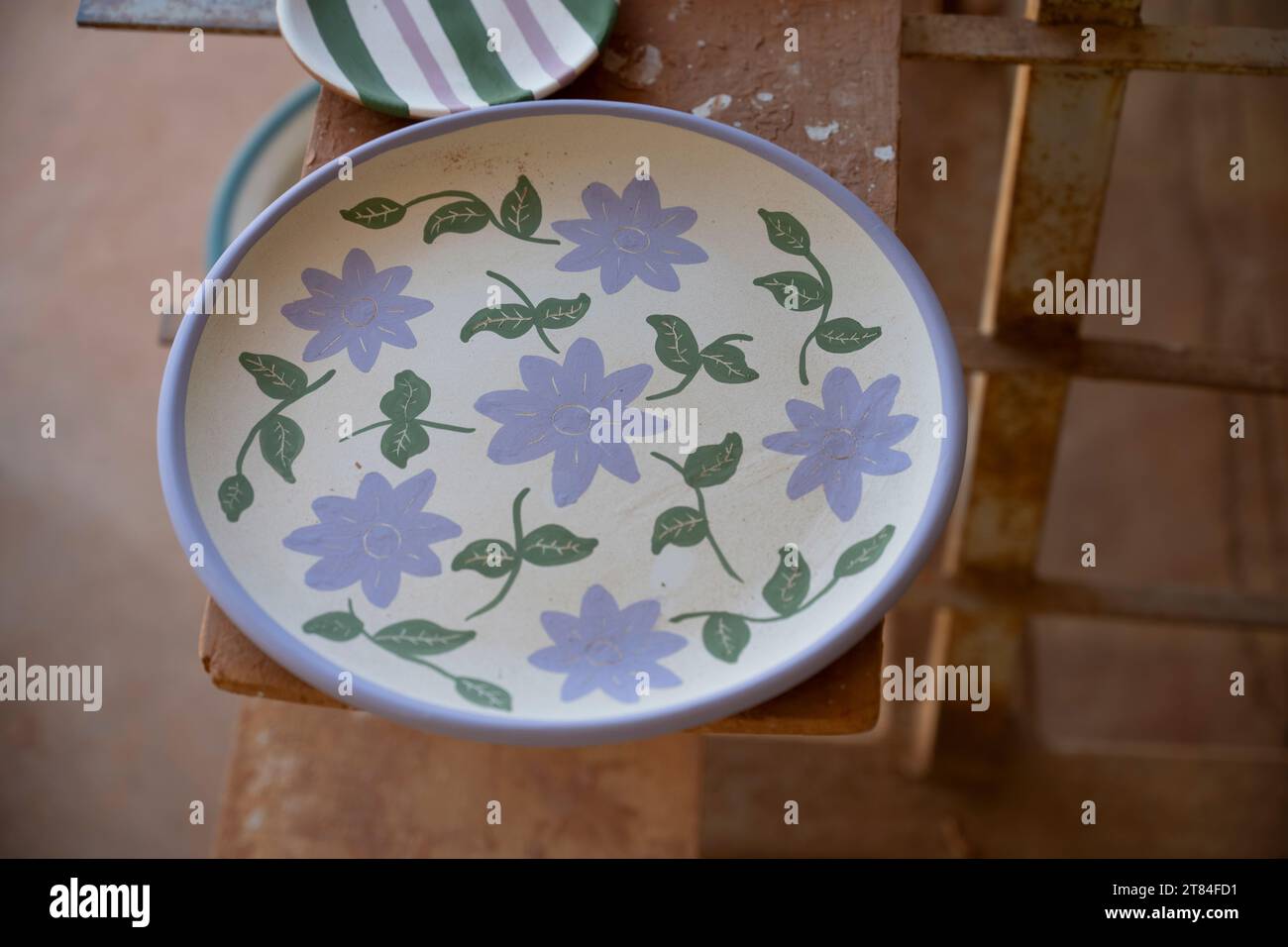Hand Painted handmade pottery drying before final firing photographed ...