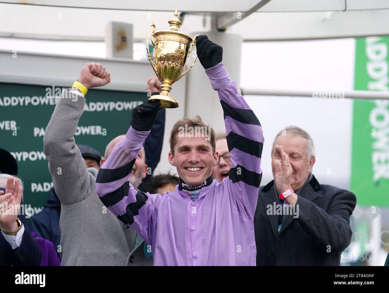 Winning jockey Harry Cobden with the trophy after winning the Paddy ...