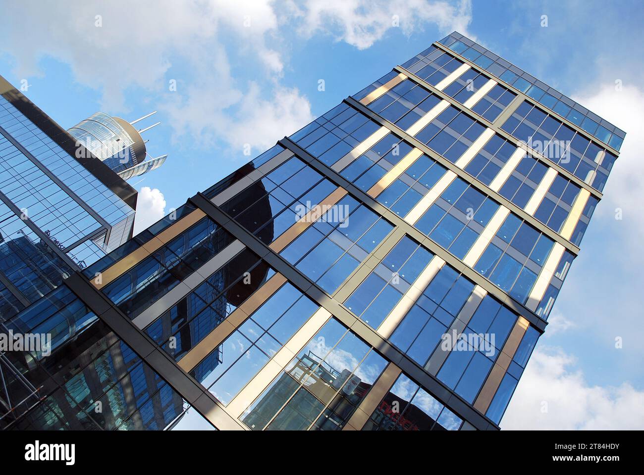 Abstract closeup of the glass-clad facade of a modern building covered ...