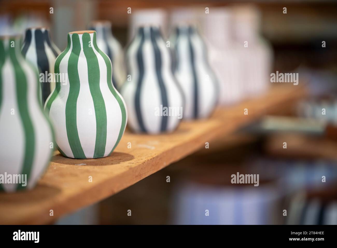 Hand Painted handmade pottery drying before final firing photographed ...