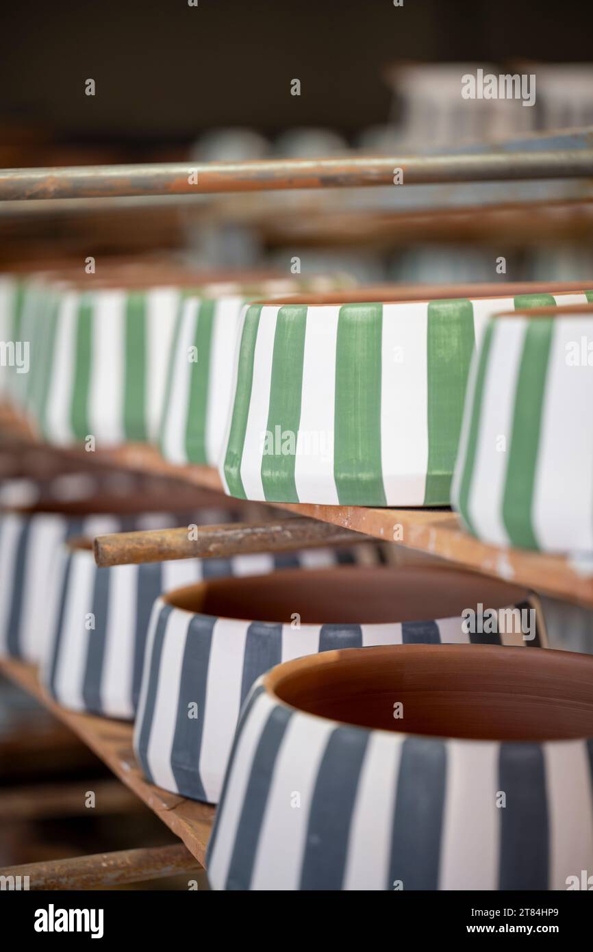 Hand Painted handmade pottery drying before final firing photographed ...