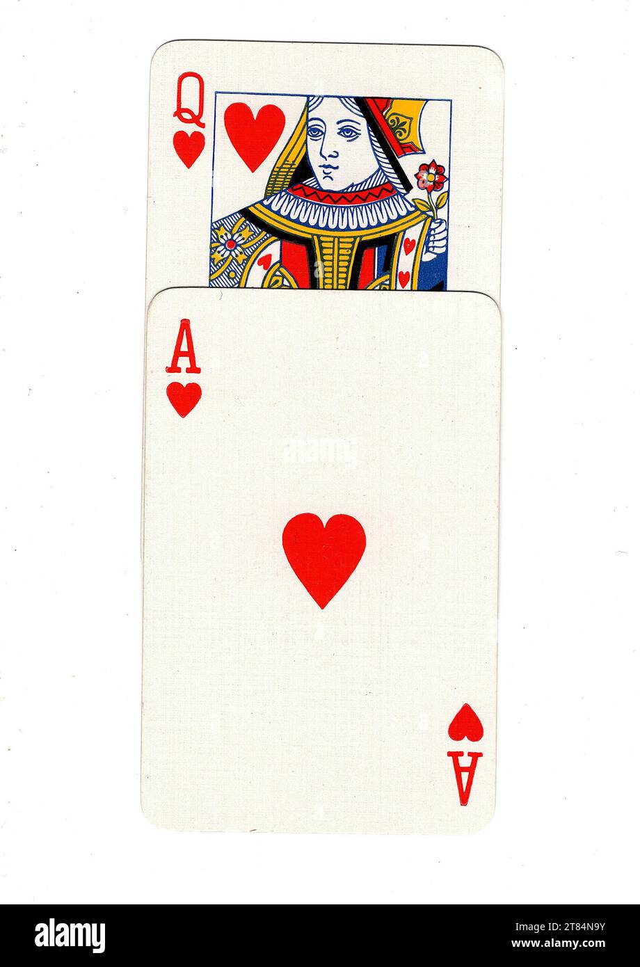 A pontoon hand of playing cards showing an ace and queen of hearts on a ...