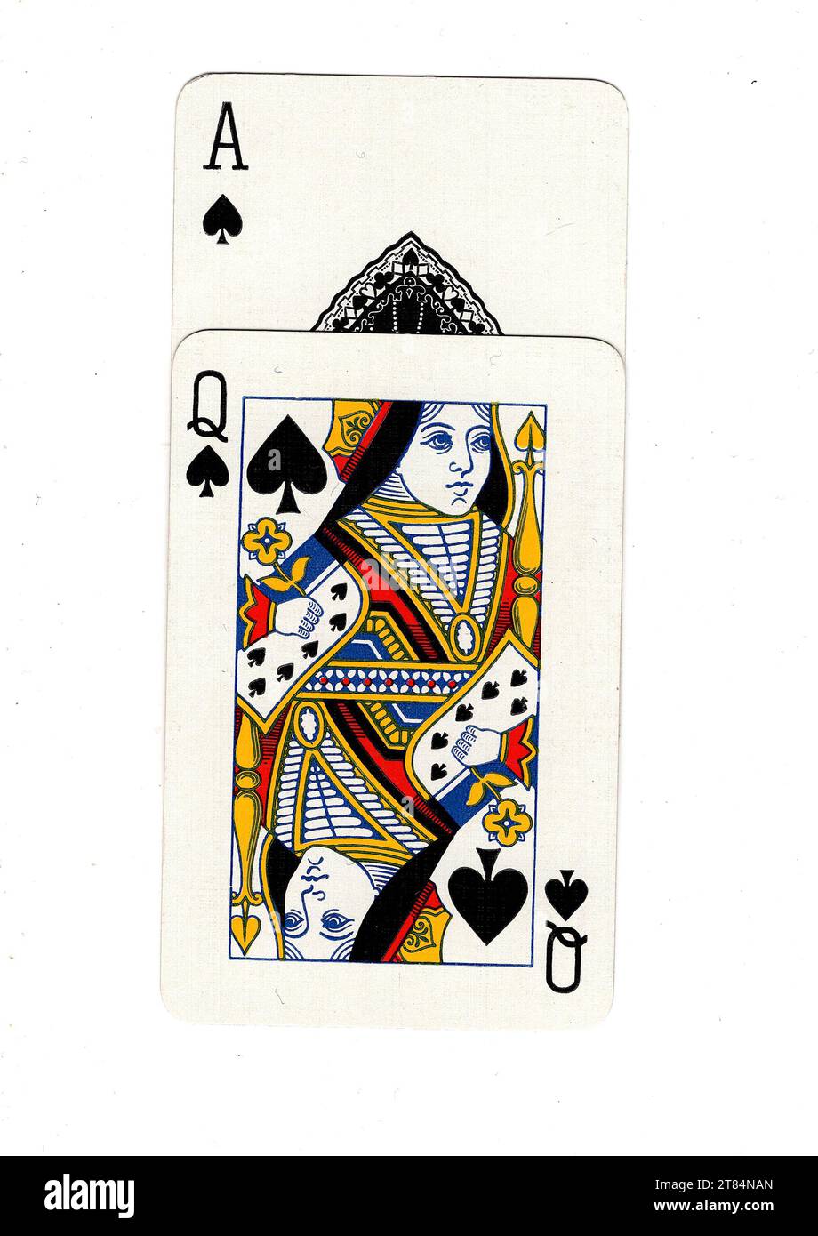 A pontoon hand of playing cards showing an ace and queen of spades on a ...