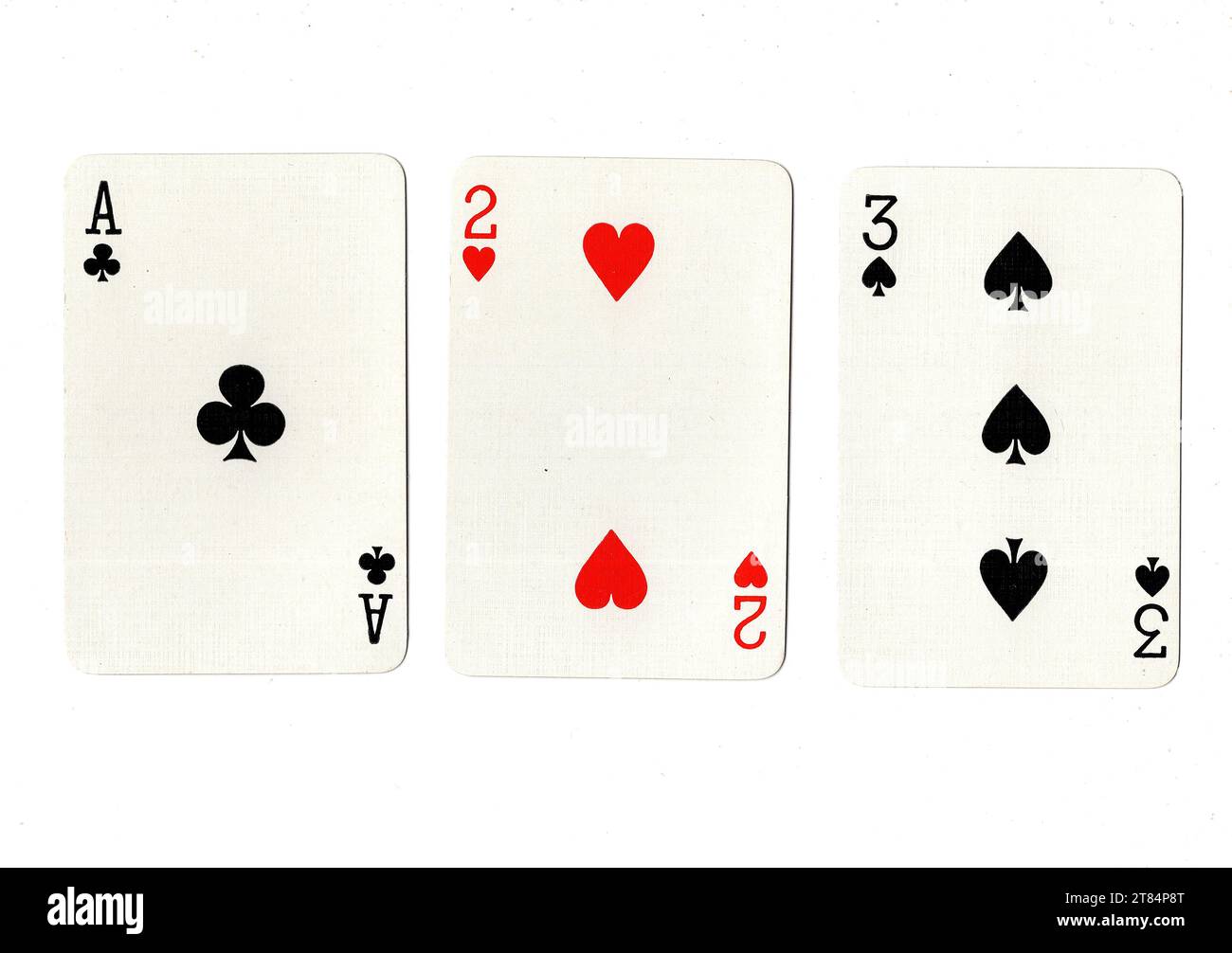 A run of three vintage playing cards showing an ace, two and three in ...