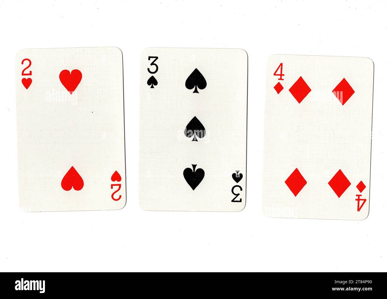 A run of three vintage playing cards showing a two, three and four in ...