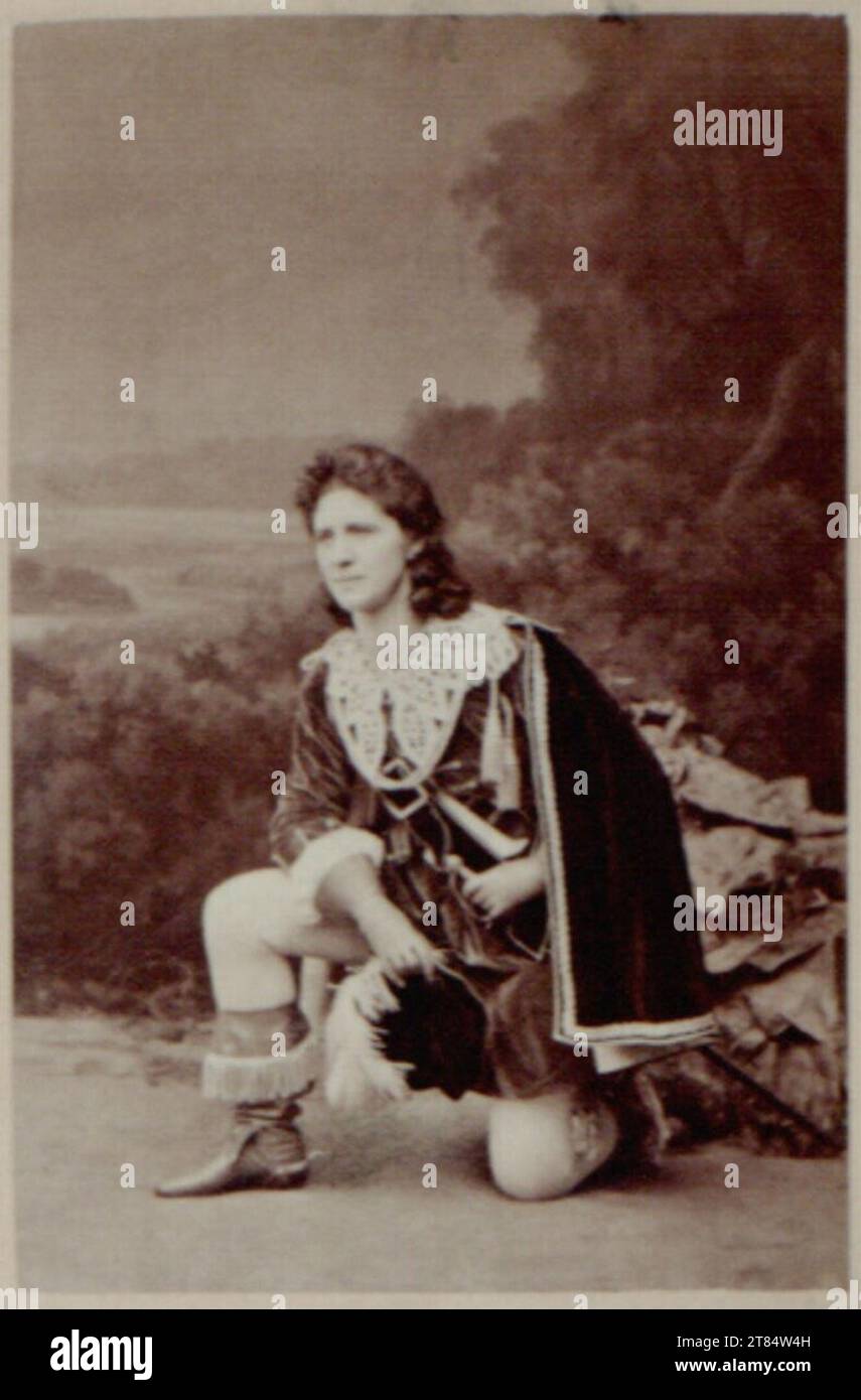 Emil Rabending Actress, in the pants role of a young hero, kneeling ...