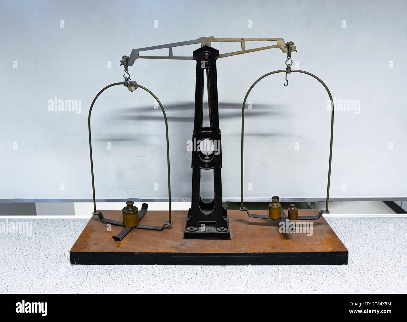 Balance and scales with weights. Symbol of justice Stock Photo - Alamy