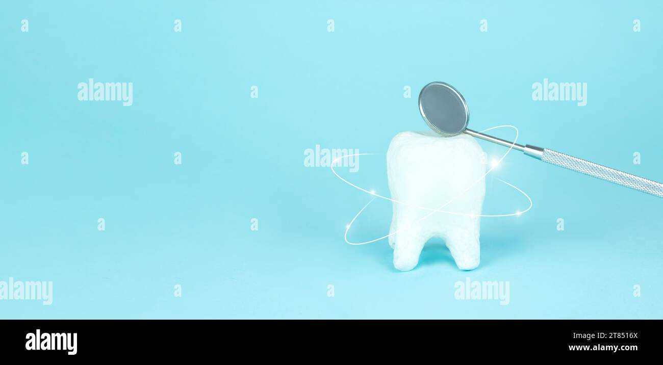 Whitening of human tooth, white shining tooth and dentist mouth mirror ...