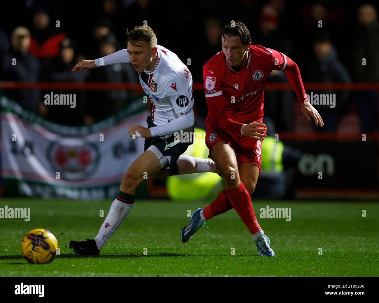 Wrexham's Jake Bickerstaff (left) and Accrington Stanley's Brad Hills ...