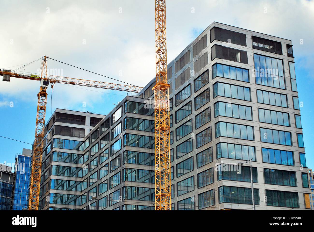 View of a skyscraper under construction. Modern architecture background ...